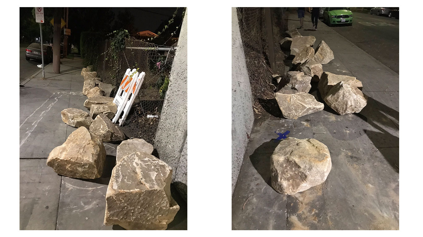 Residents and activists remove stones set up to deter homeless ...