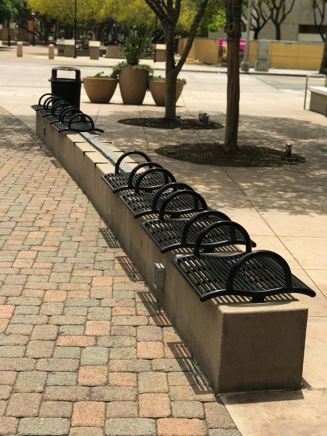 Residents and activists remove stones set up to deter homeless ...